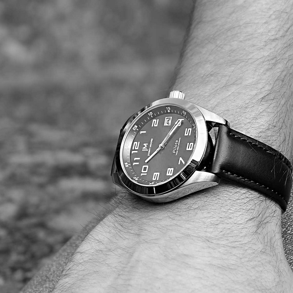 Jonny Moore luxury Pilote watch with a brown leather strap and a blue ...